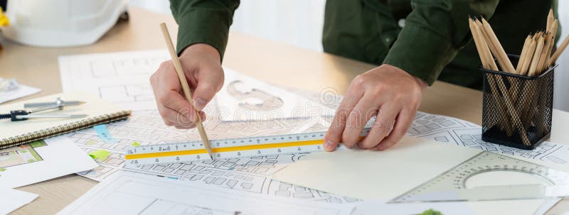 Professional Engineer Working on Architectural Project at Studio ...