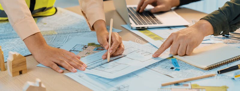 Professional Engineer Team Discussion about House Design. Closeup ...