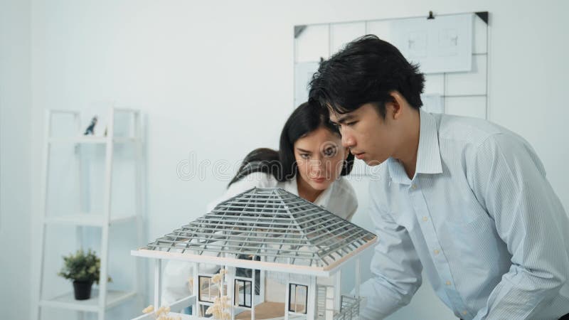 Professional Engineer Team Working Together while Using Equipment ...