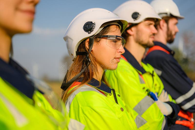 Professional Engineer Technician Working Outdoor at Wind Turbine Field ...