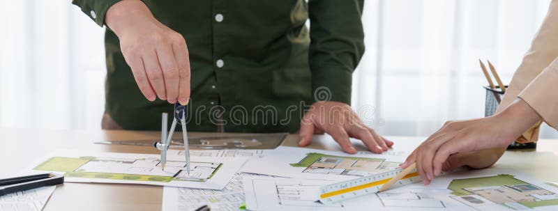 Professional Engineer Using Divider To Measure Blueprint. Closeup ...