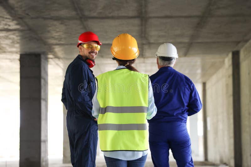 Professional Engineers in Safety Equipment Stock Photo - Image of ...