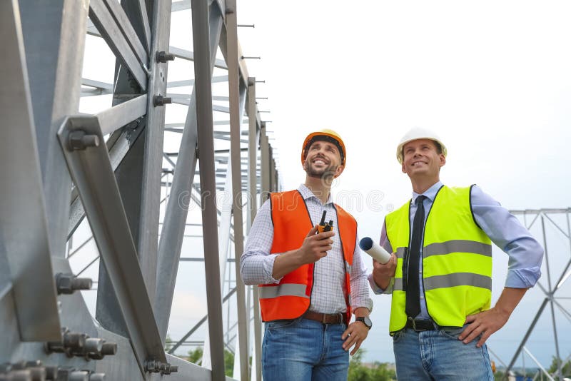 Professional Engineers Working on Installation of Electrical Substation ...