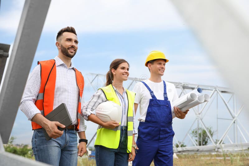 Professional Engineers Working on Installation of Electrical Substation ...