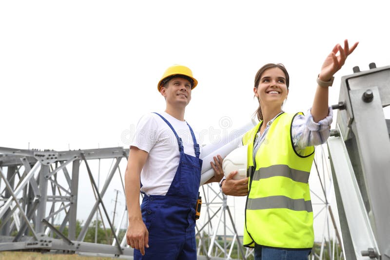 Professional Engineers Working on Installation of Electrical Substation ...
