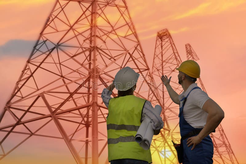 Professional Engineers Working on Installation of Electrical Substation ...