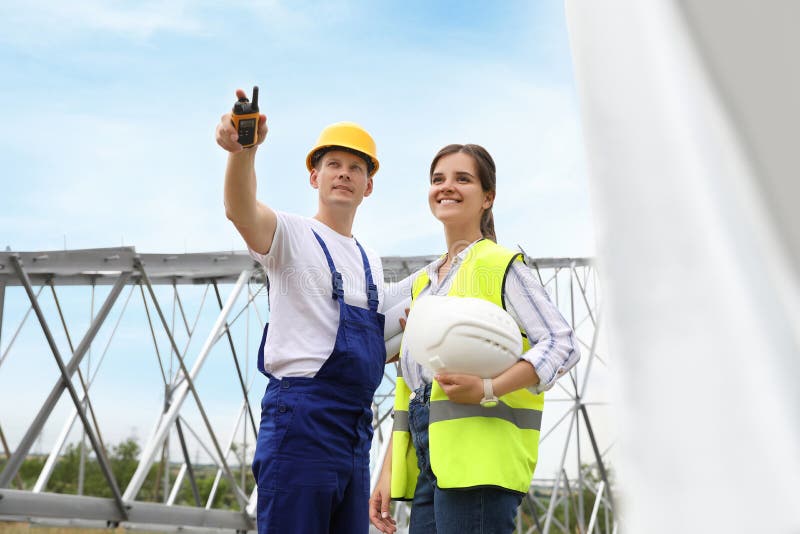 Professional Engineers Working on Installation of Electrical Substation ...