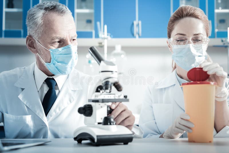 Professional Experienced Scientists Sitting at the Table Stock Image ...