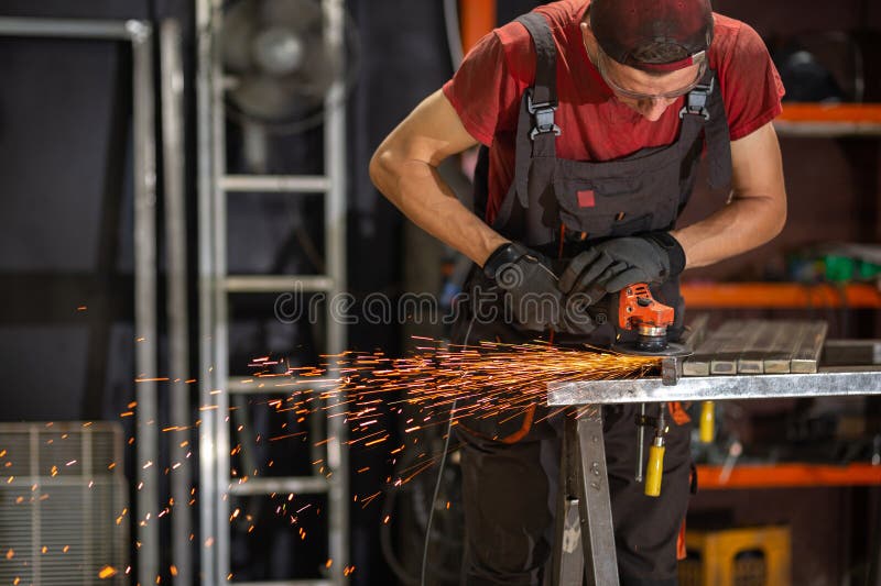 Professional Fabric Worker Working with Metal Profile on the Work Table ...