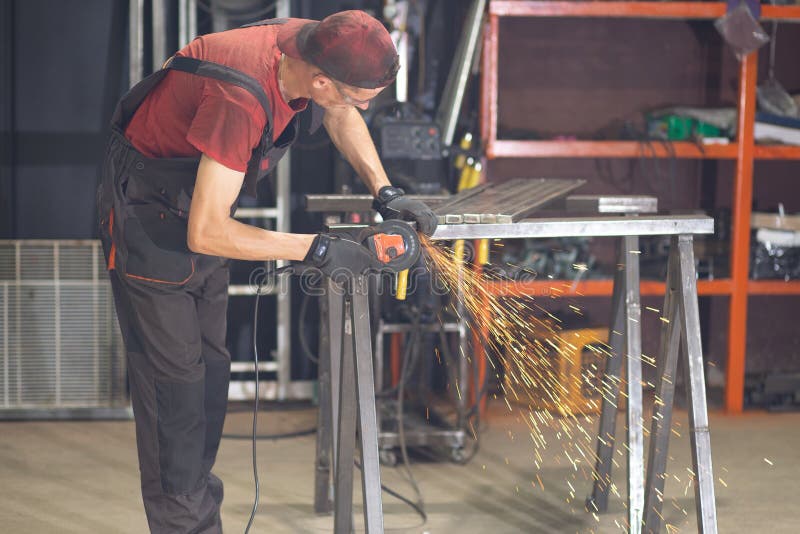 Professional Fabric Worker Working with Metal Profile on the Work Table ...