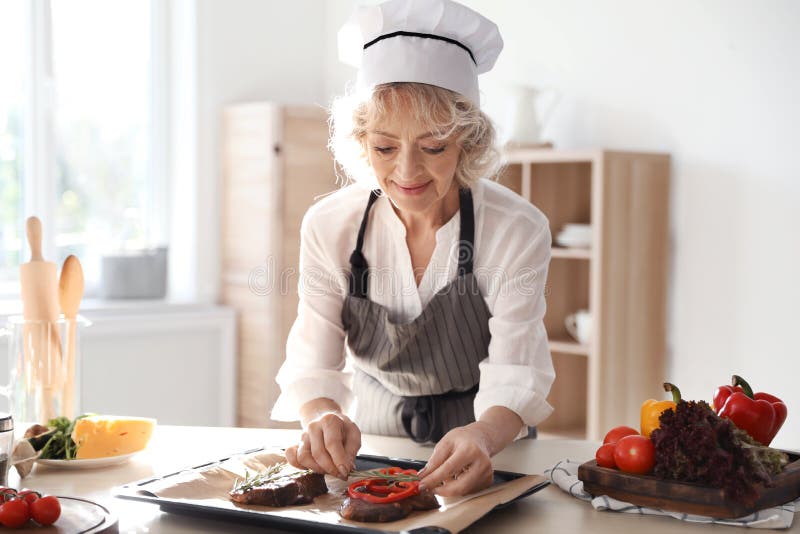 Professional Female Chef Preparing Meat on Table Stock Image - Image of ...