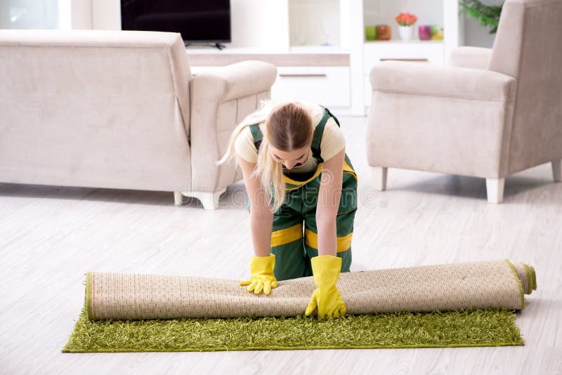The Professional Female Cleaner Cleaning Carpet Stock Photo - Image of ...