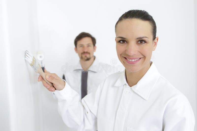 Professional Female Painter Painting Wall with Paintbrush Stock Image ...