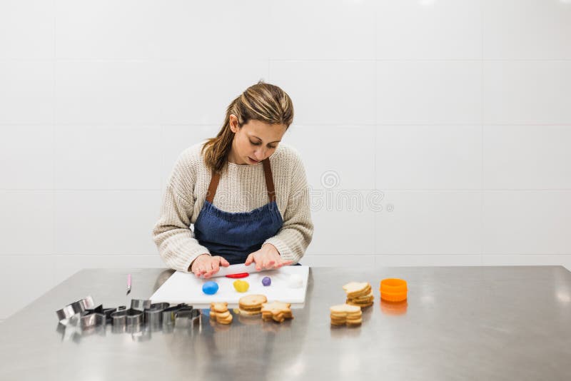 Professional Female Pastry Chef Preparing Delicious Cookies in the ...
