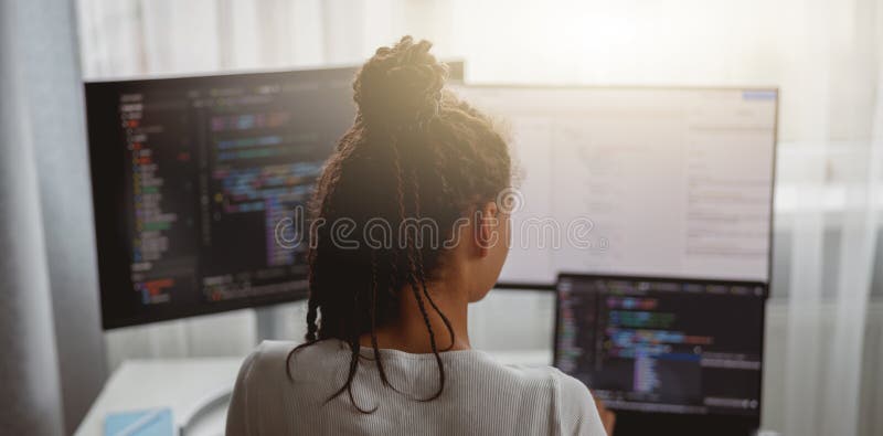 Professional Female Programmer Working on New Project on Computer at ... Professional Female Programmer Working on New Project on Computer at ...
