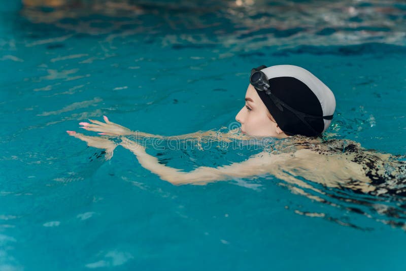 Professional Female Swimmer Training in a Swimming Pool. Stock Image ...