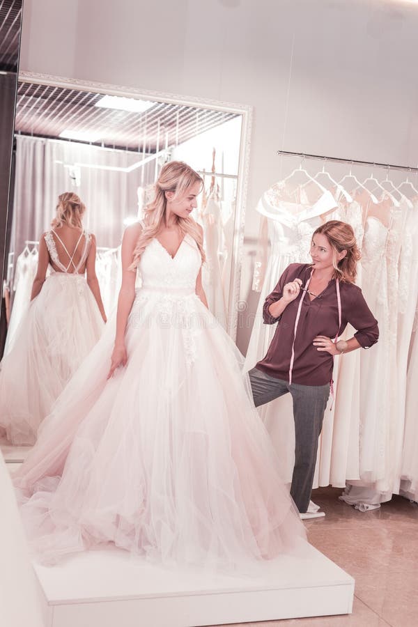 Professional Female Tailor Looking at the Bride Stock Photo - Image of ...