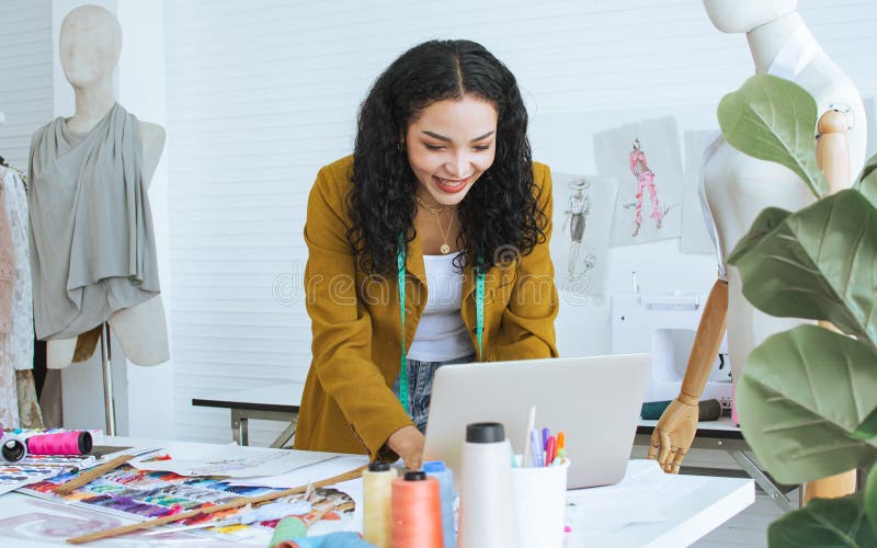 Professional Female Tailor Wearing Modern Suit, Working, Using Computer ...