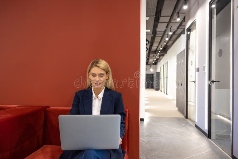 Professional Female Wearing Suit Working on Computer in Office Hall ...