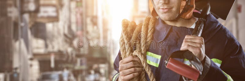 Composite Image of Professional Fireman Stock Photo - Image of frowning ...