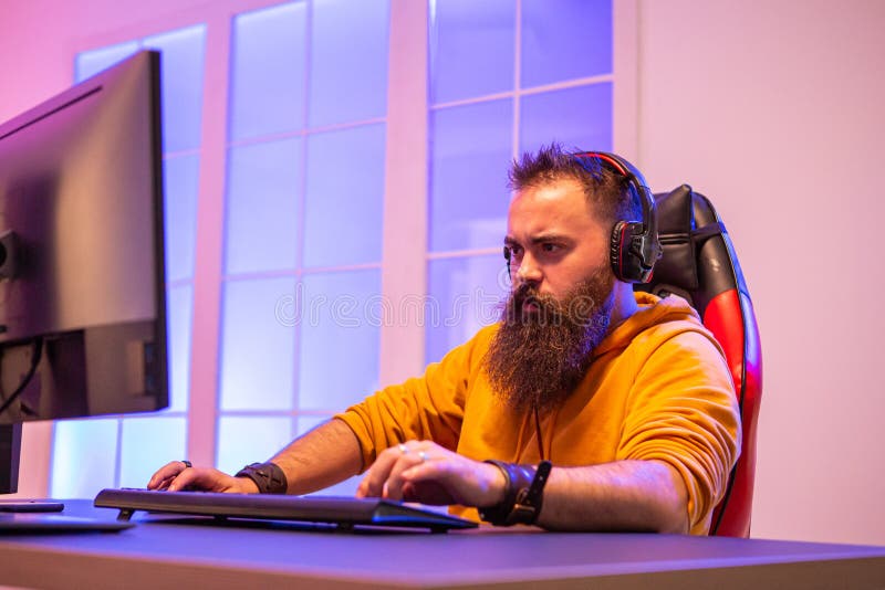 Professional Gamer with Long Beard in Front of Powerful Gaming Rig ...
