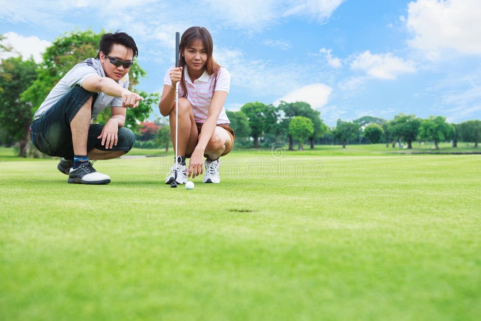 Professional Golfer Teaching To Play Golf Stock Photo - Image of action ...