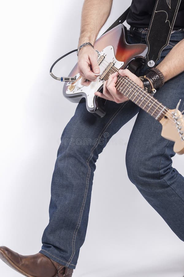 Professional Guitar Musician Legs Closeup. Posing Against White Stock ...