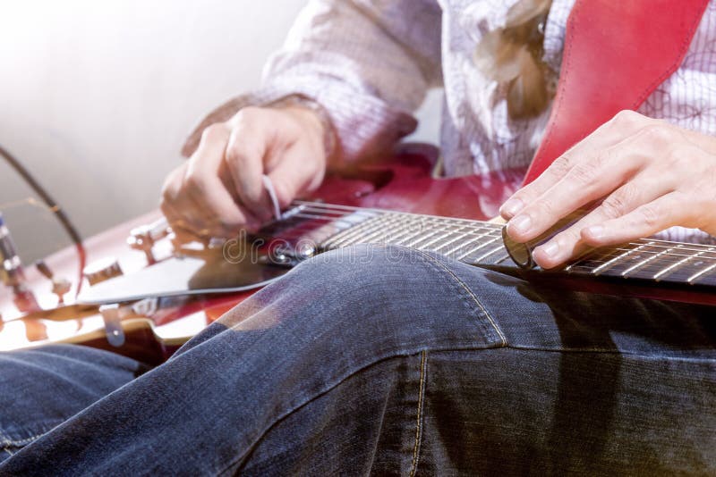 Professional Guitar Player with Electric Guitar Hands Closeup. S Stock ...