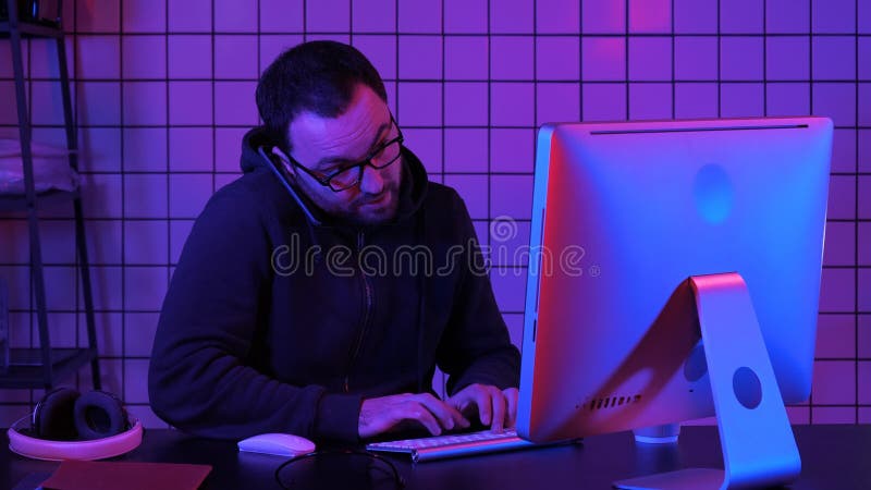 Professional Hacker Using Mobile Cell Phone Talking and Spreadin Stock ...