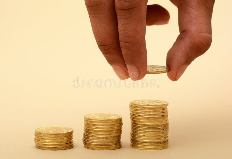 Professional Hand Putting on Stack of Golden Coins Stock Photo - Image ...