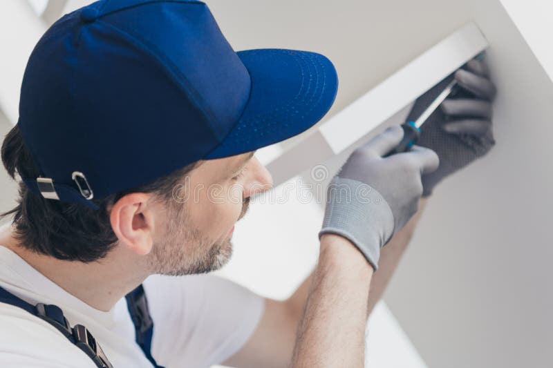 Dedicated Handyman Expertly Installing Fixtures, Showcasing Skilled ...