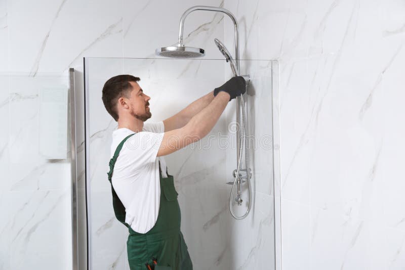 Professional Handyman Working in Shower Booth Indoors Stock Photo ...