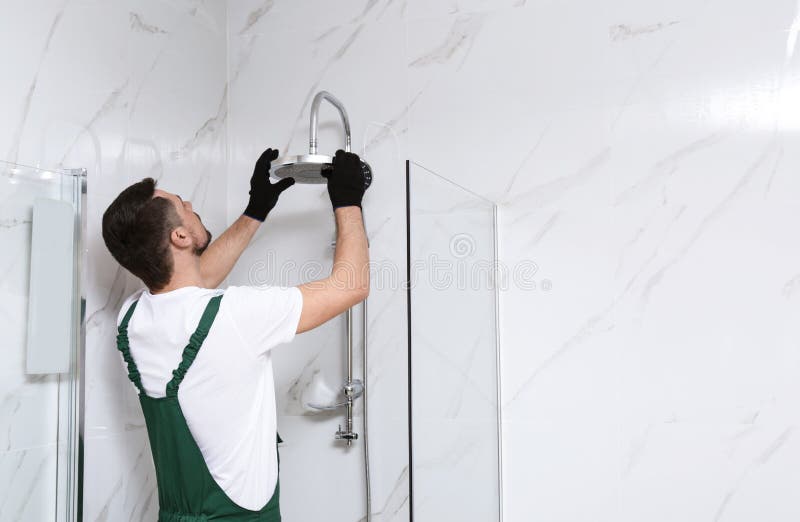 Professional Handyman Working in Shower Booth Indoors Stock Image ...