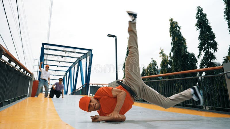 Professional Hipster Doing Head Spin while Friend Cheering Him ...