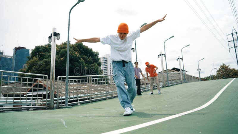 Professional Asian Hipster Walking while Doing Freeze Pose at Bridge ...