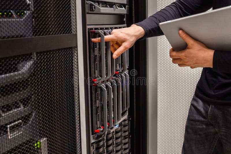 It Professional Holding Digital Tablet Checking Blade Servers in ...