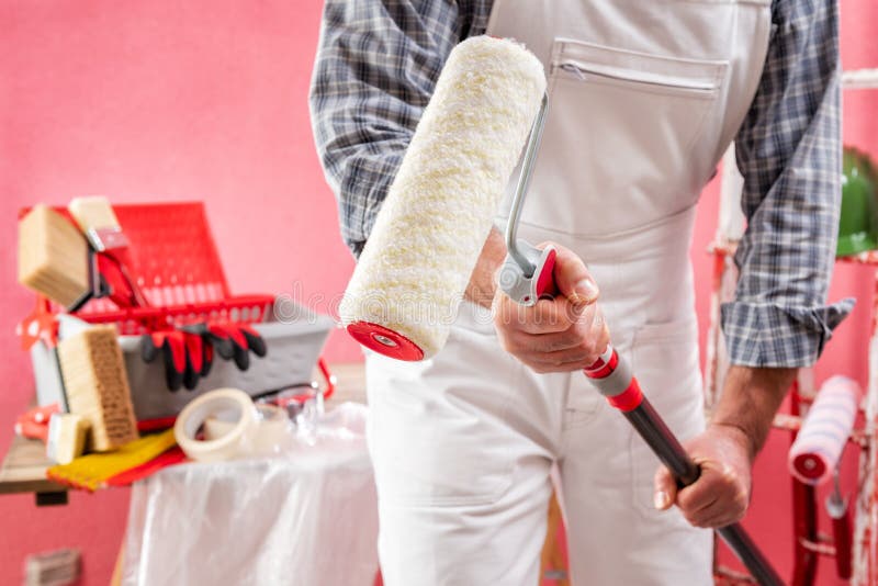 Professional House Painter at Work on the Construction Site Stock Image ...