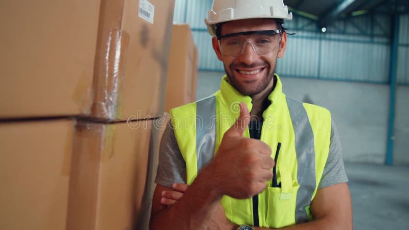 Professional Industry Worker Give Thumb Up in the Factory or Warehouse ...