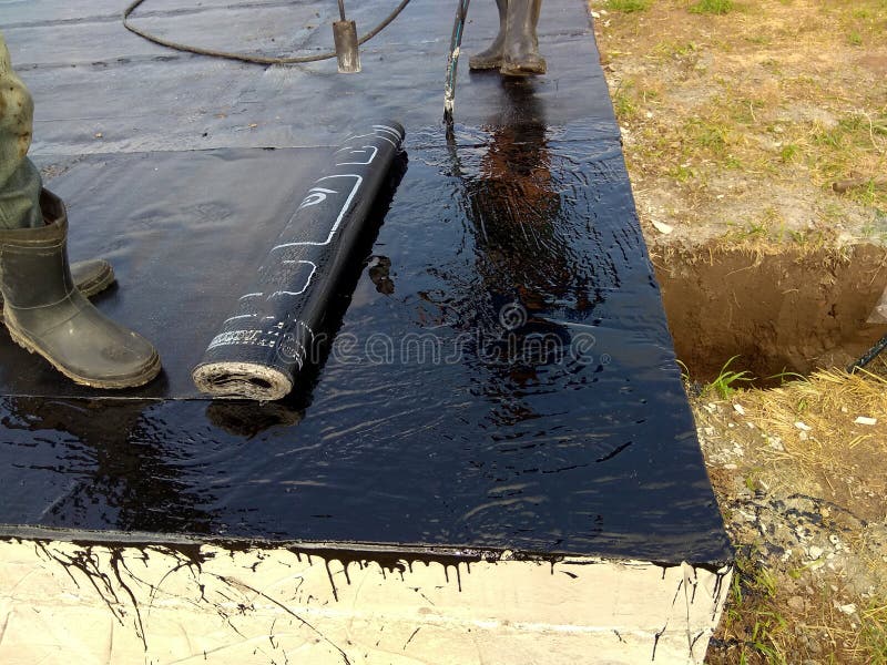 Waterproofing Concrete Floor with Mortar and Brush. an Industrial ...