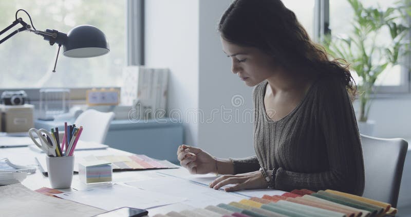 Professional Interior Designer Sitting at Desk and Working Stock Photo ...
