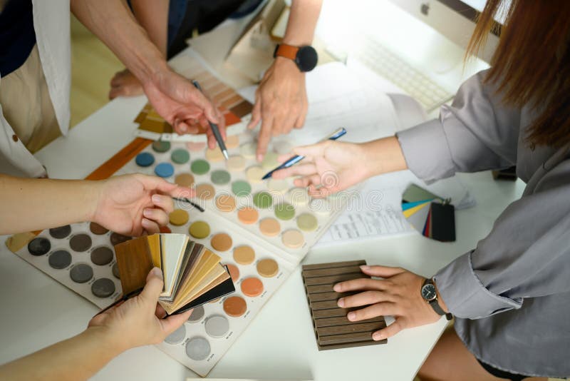 Professional Interior Designers Planning for House Project Working with ...