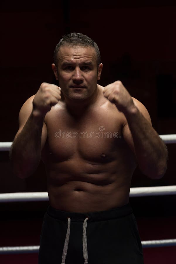 Professional Kickboxer in the Training Ring Stock Photo - Image of fist ...
