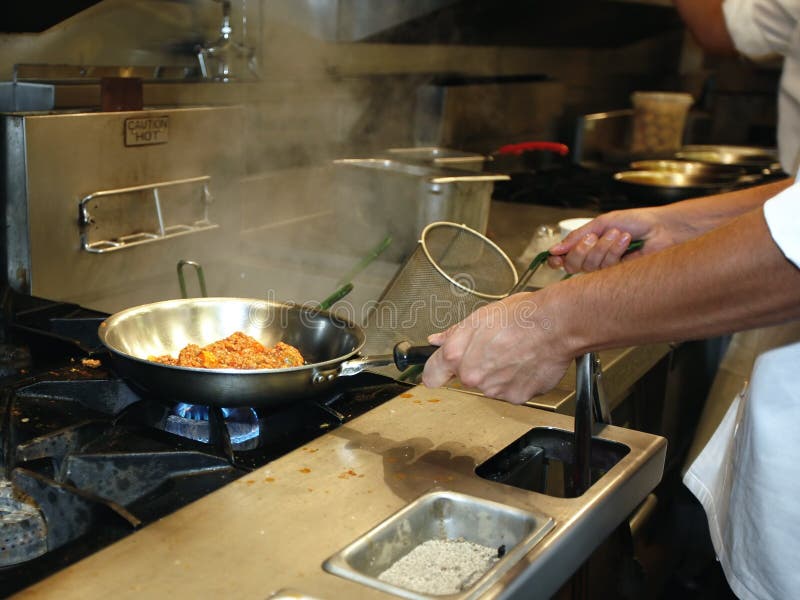 Chef Preparing Fish in Restaurant or Hotel Kitchen Stock Photo - Image ...