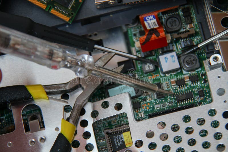Professional laptop repair stock image. Image of component - 165133101