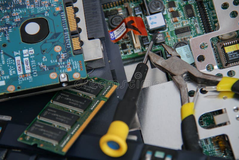 Professional laptop repair stock photo. Image of component - 165133226