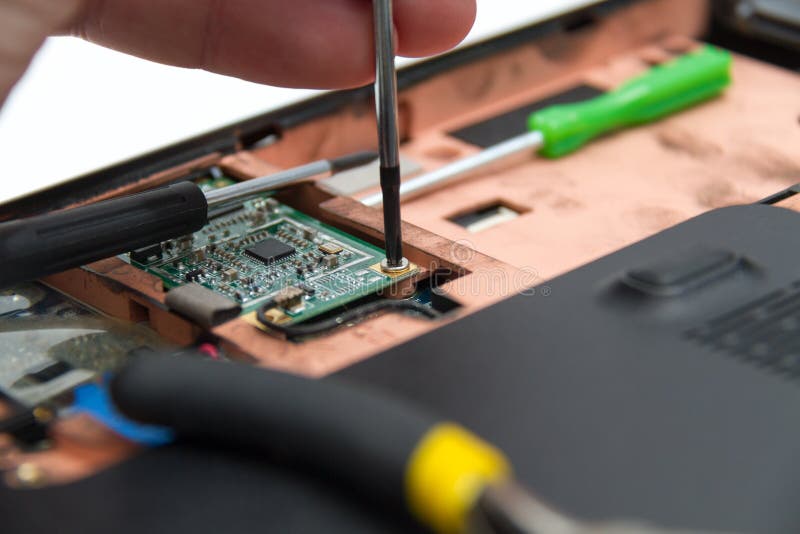 Professional laptop repair stock image. Image of assembly - 49036245