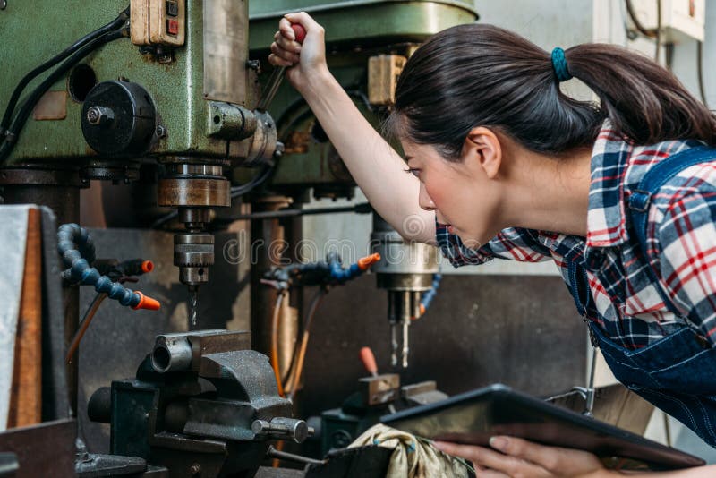 Worker Adjust Machine To Correct Position Stock Photos - Free & Royalty ...