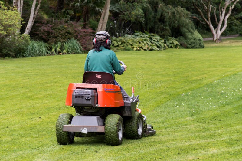 Professional lawn mowing editorial photography. Image of work - 60641802