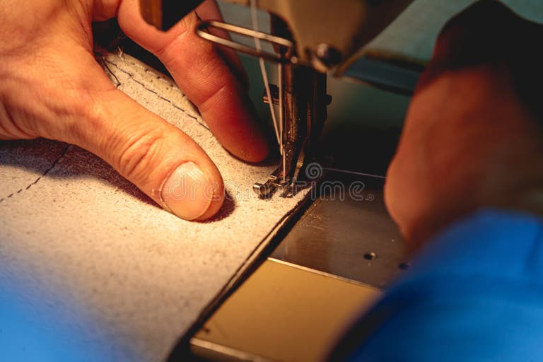 Professional Leatherworker Making a Leather Clothing with a Sewing ...