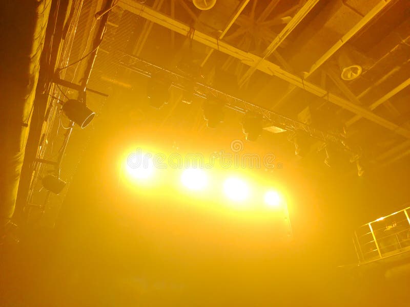 Professional Lighting Equipment on Stage Ceiling on Blurred Smoke ...